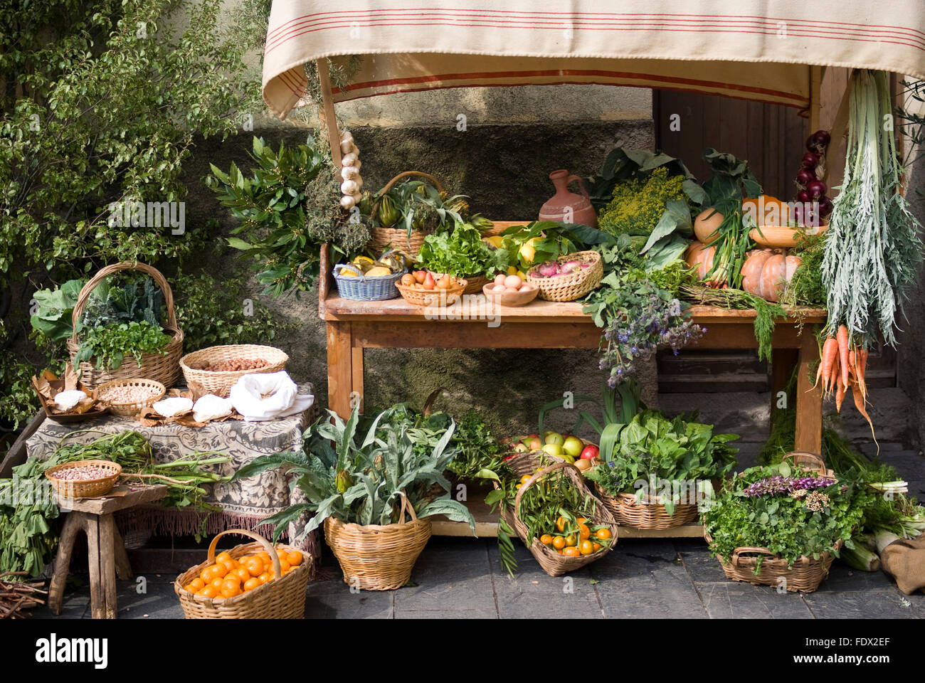 Medieval market stall selling fruit Stock Photo - Alamy