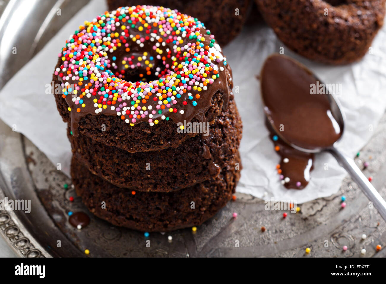Stack of homemade baked chocolate donuts with glaze Stock Photo - Alamy