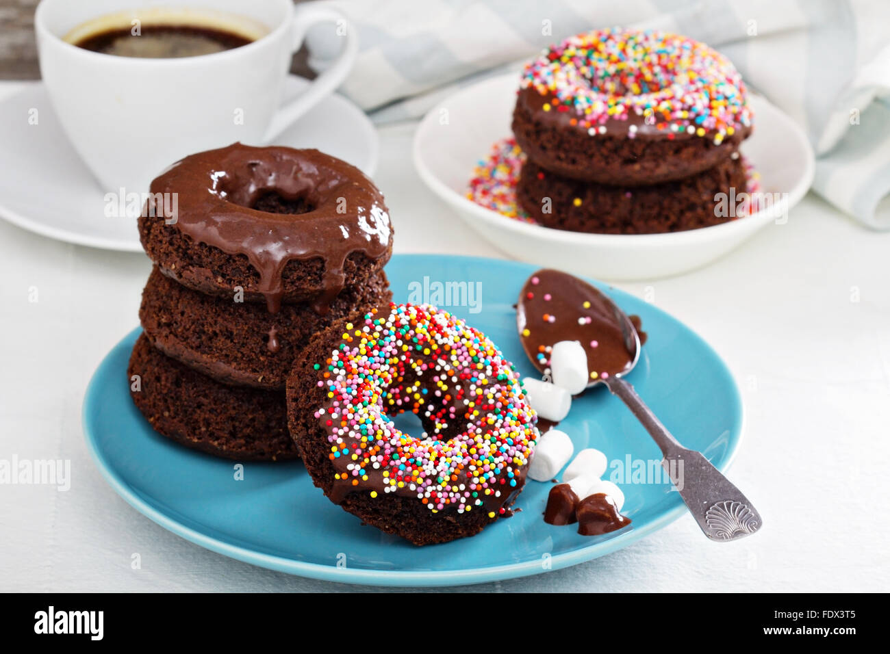 Stack of homemade baked chocolate donuts with glaze Stock Photo - Alamy