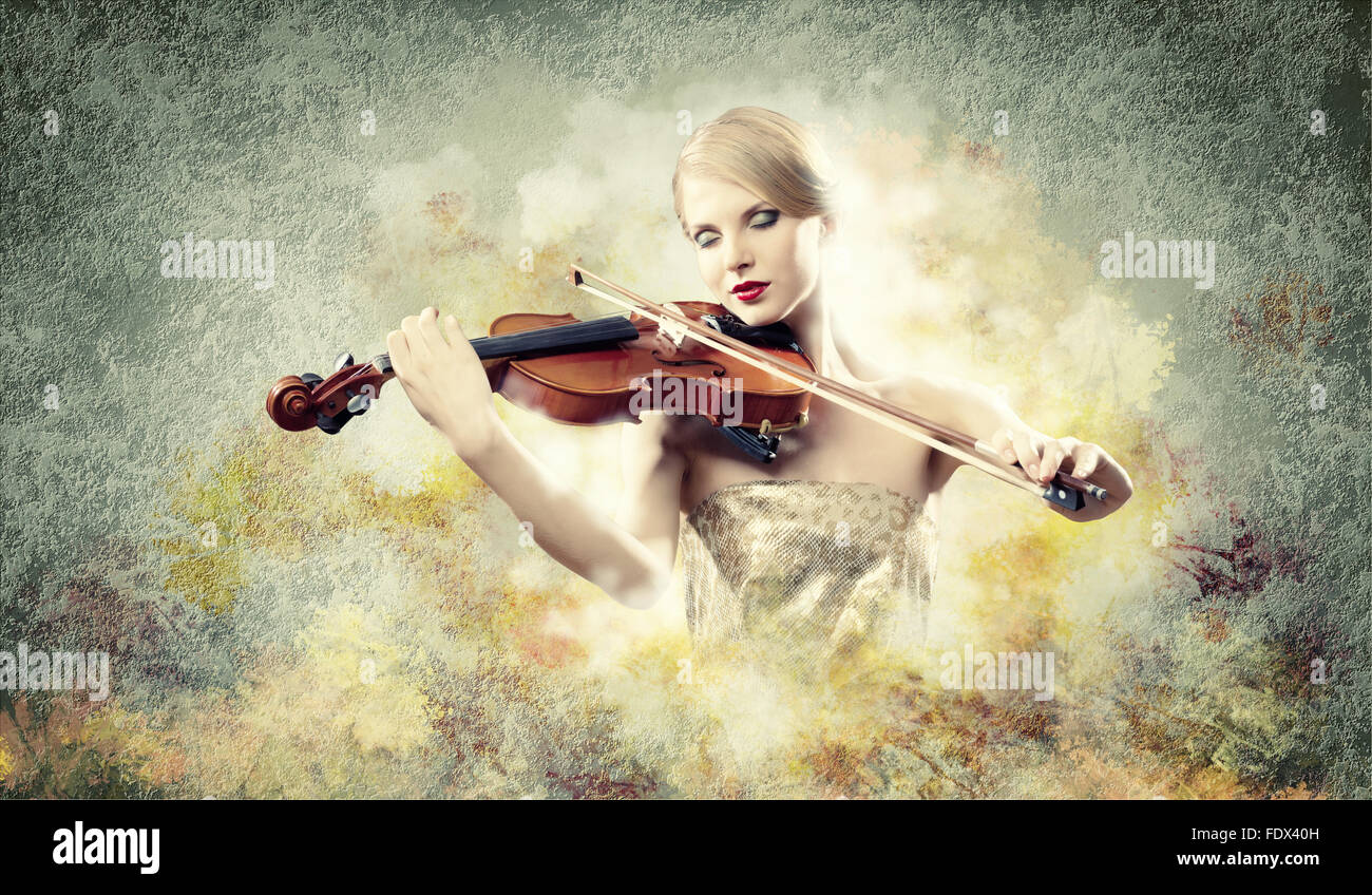Image of beautiful female violinist playing with closed eyes against ...