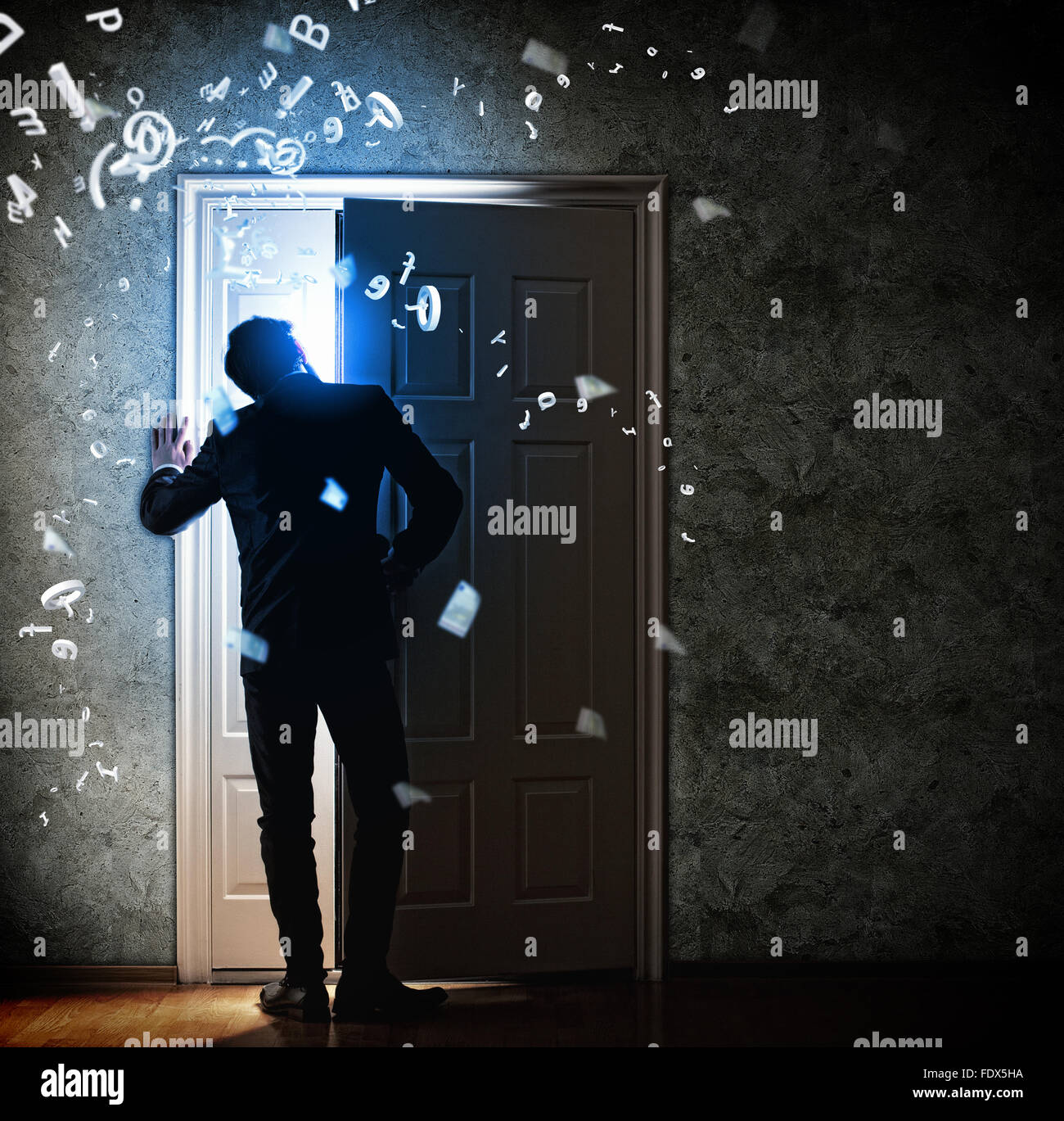 Image of young businessman standing with back opening door Stock Photo ...