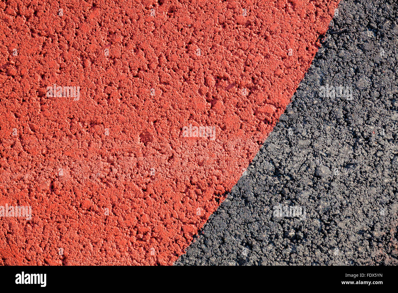 Red paint in asphalt texture Stock Photo - Alamy