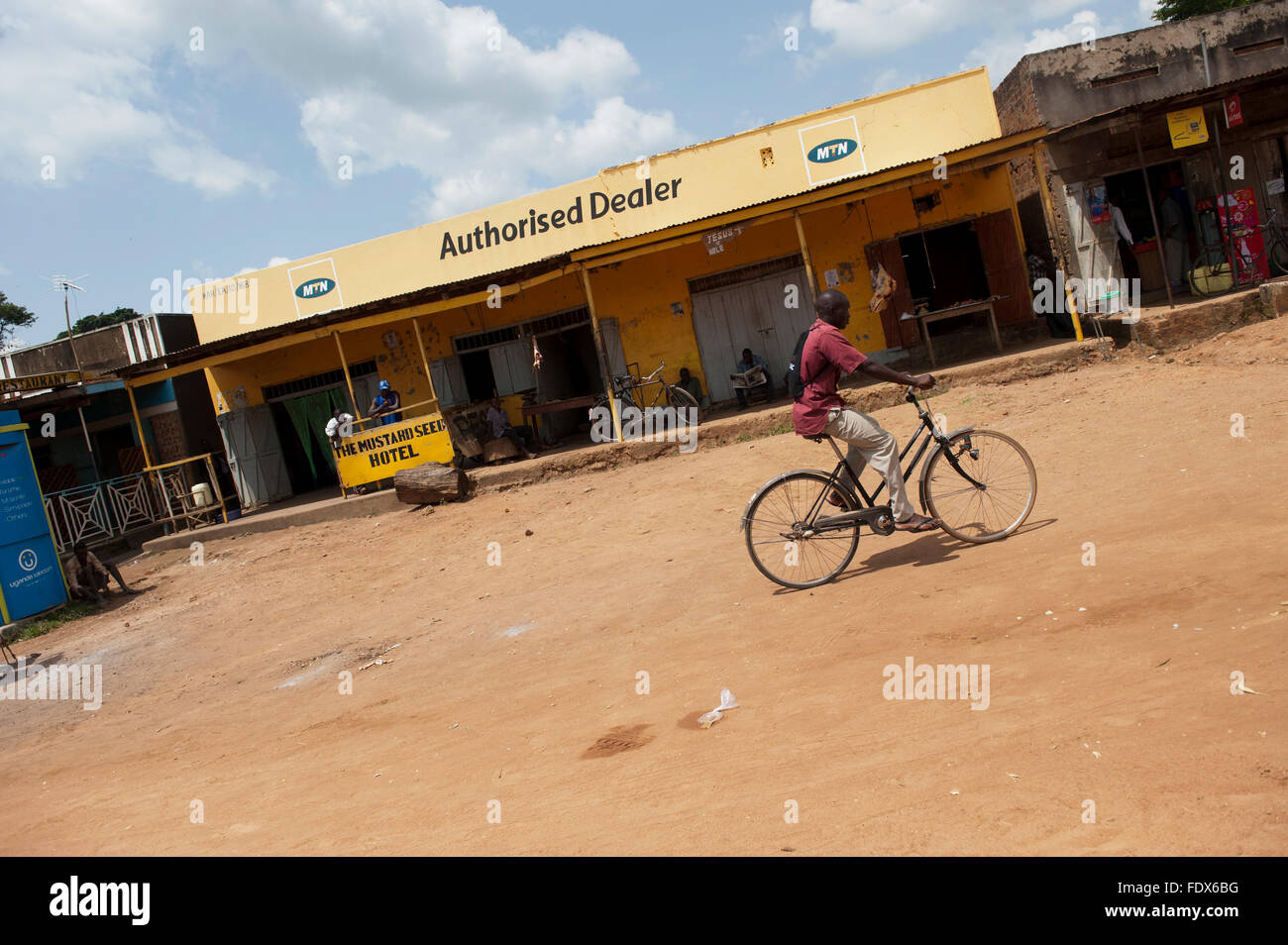 Roadside shops in rural Ugandan village. Showing a low standard of ...