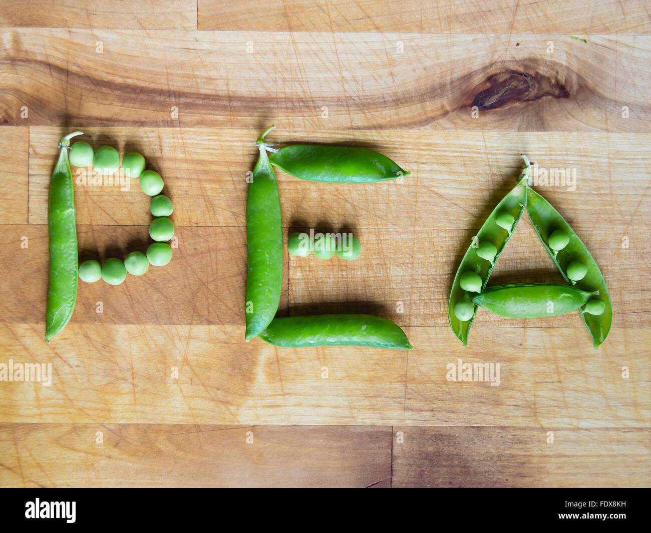 Word PEA written with peas Stock Photo - Alamy