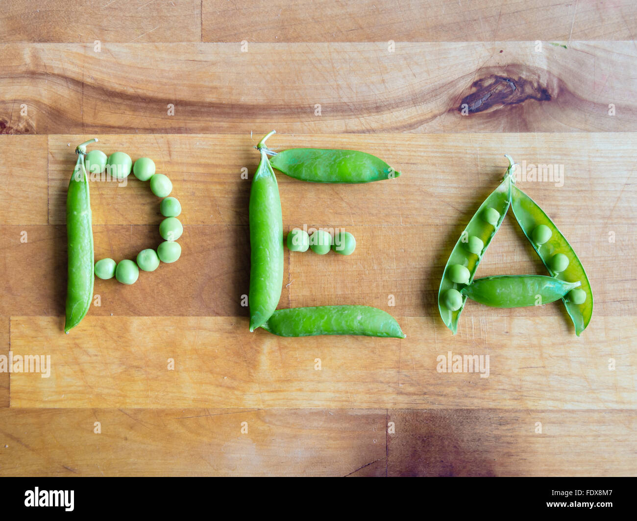 Word PEA written with peas Stock Photo - Alamy