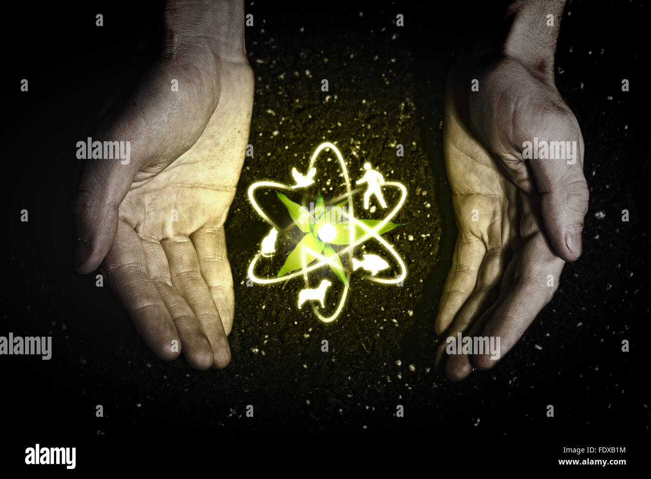 Human hands holding a green sprout and ecology symbols Stock Photo - Alamy