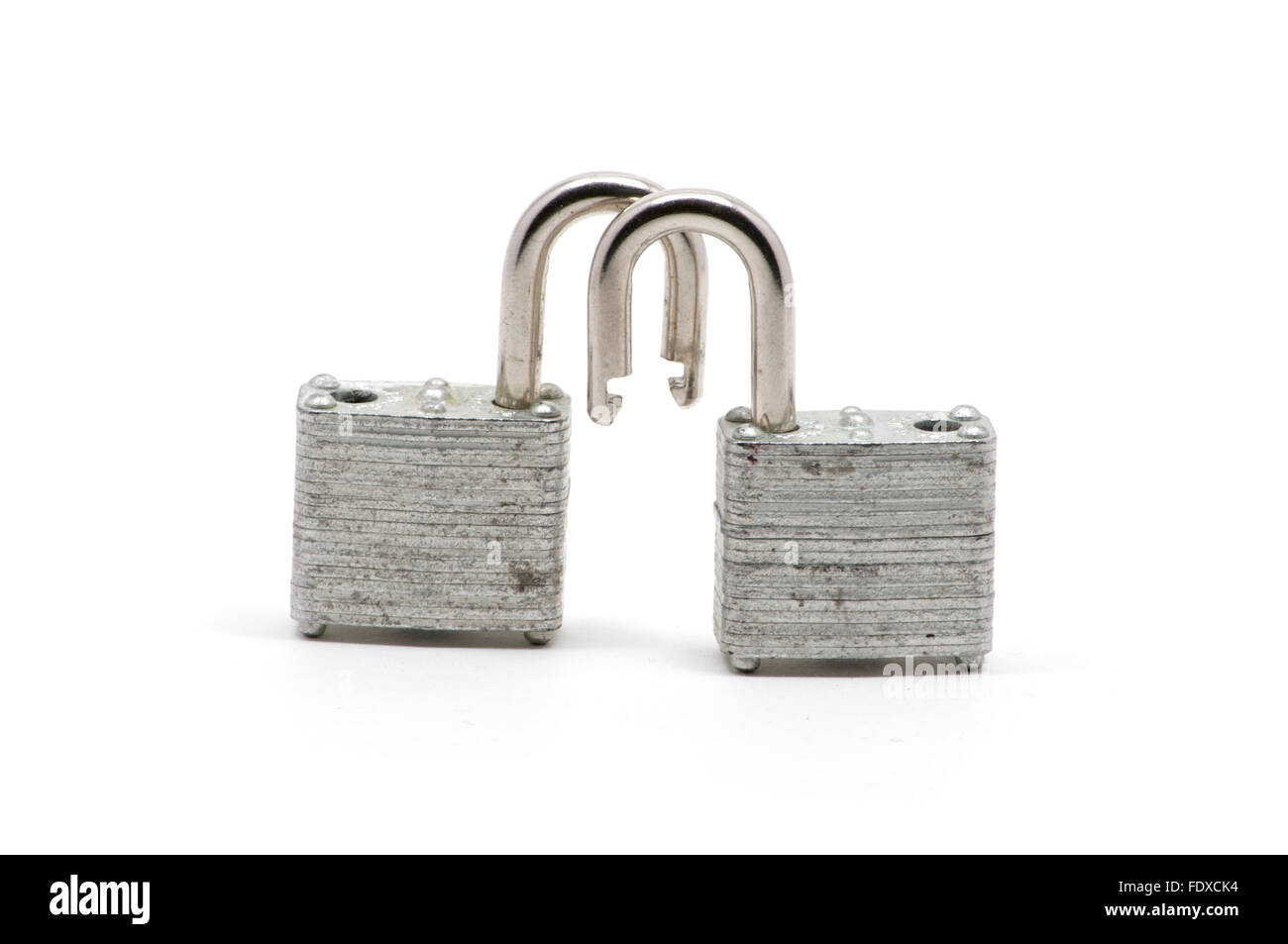 Isolated close up of two silver locks Stock Photo - Alamy
