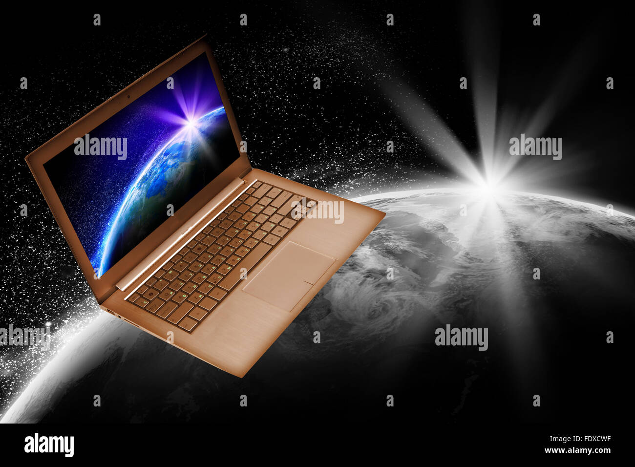 Notebook with our planet earth against black background with globe ...