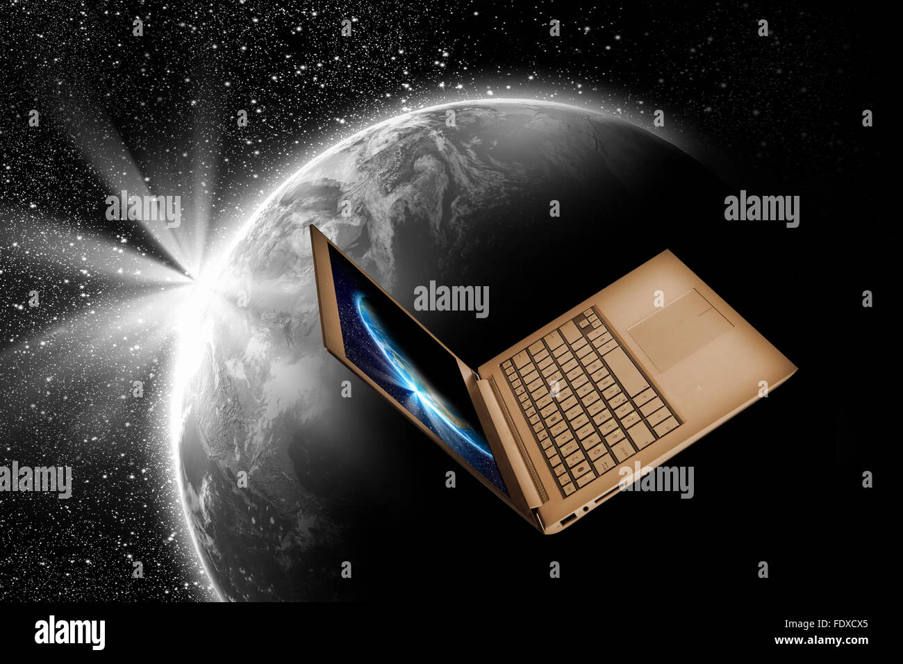 Notebook with our planet earth against black background with globe ...