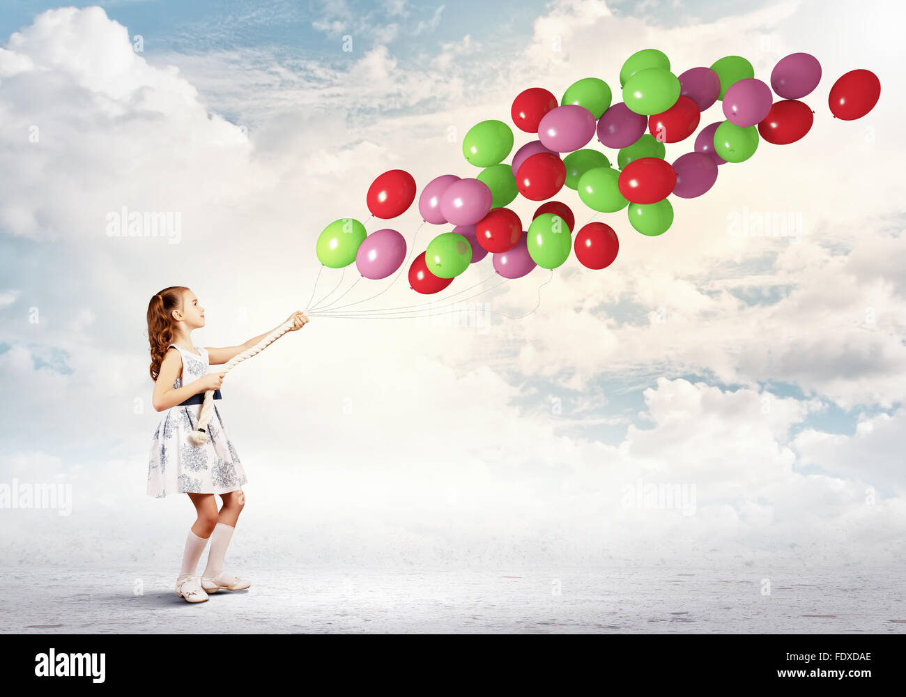 Image of little cute girl with bunch of color balloons Stock Photo - Alamy