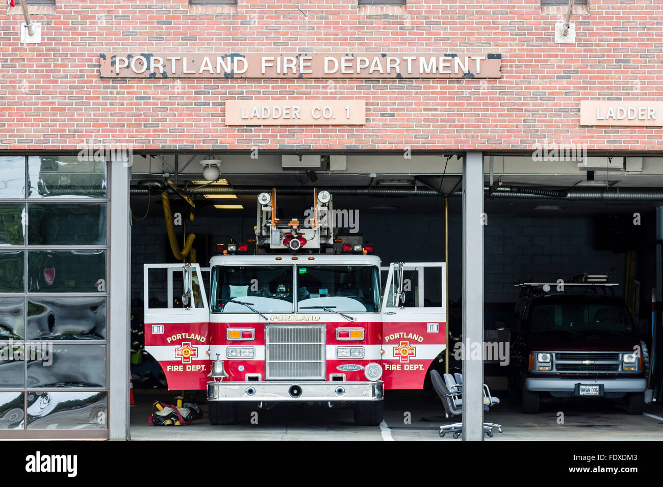 Fire truck in open bay of brick firehouse in Portland, Maine Stock ...
