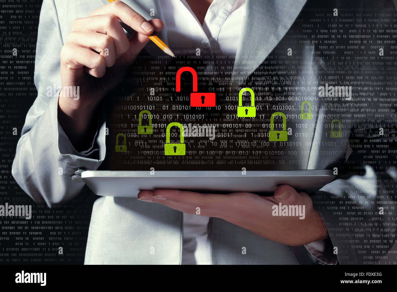 Businesswoman holding tablet pc entering password. Security concept ...