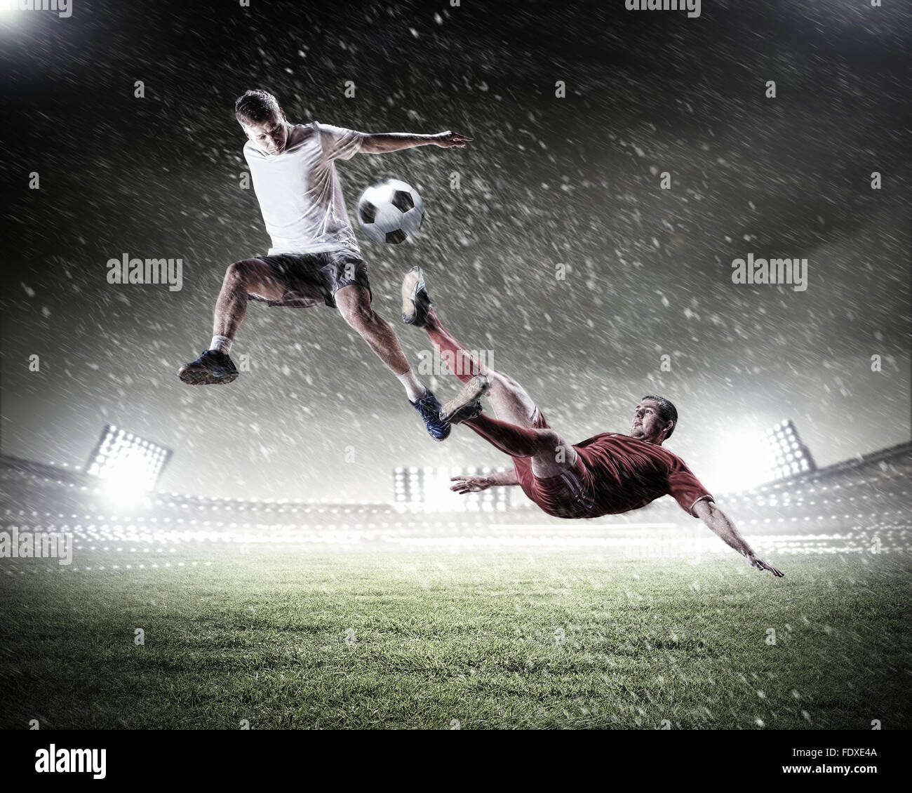 Image of two football players at stadium Stock Photo - Alamy
