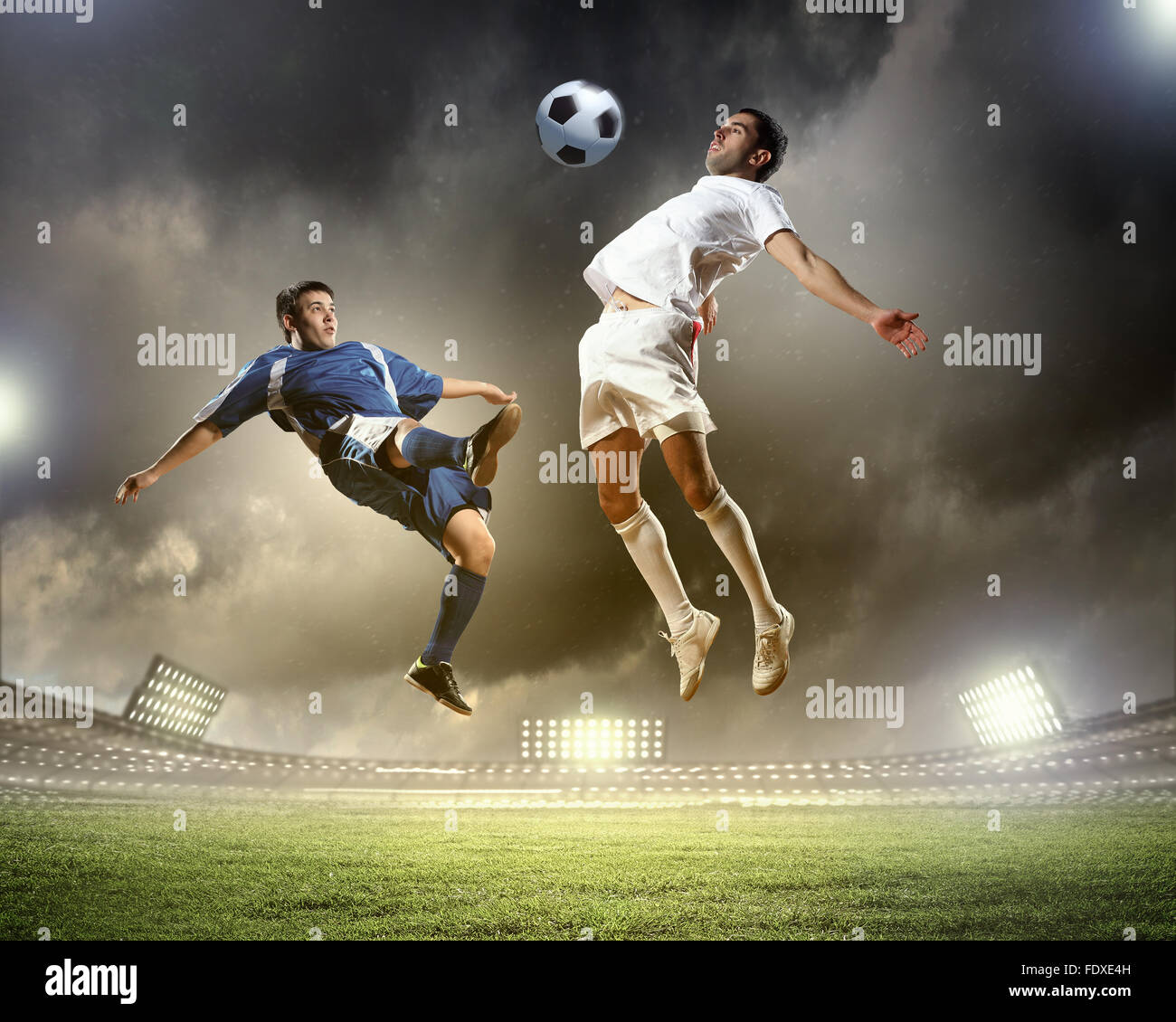 Image of two football players at stadium Stock Photo - Alamy