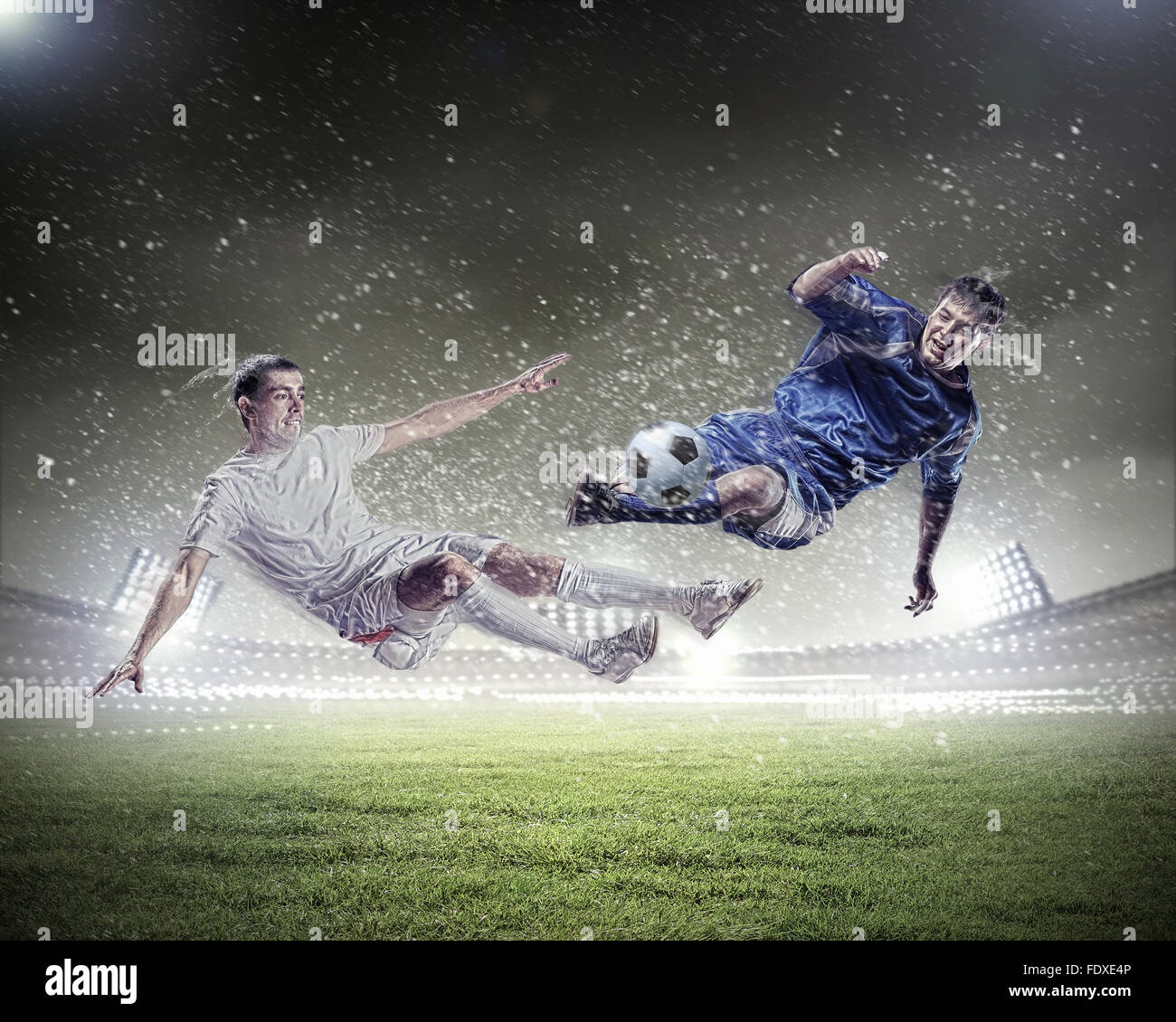 Image of two football players at stadium Stock Photo - Alamy