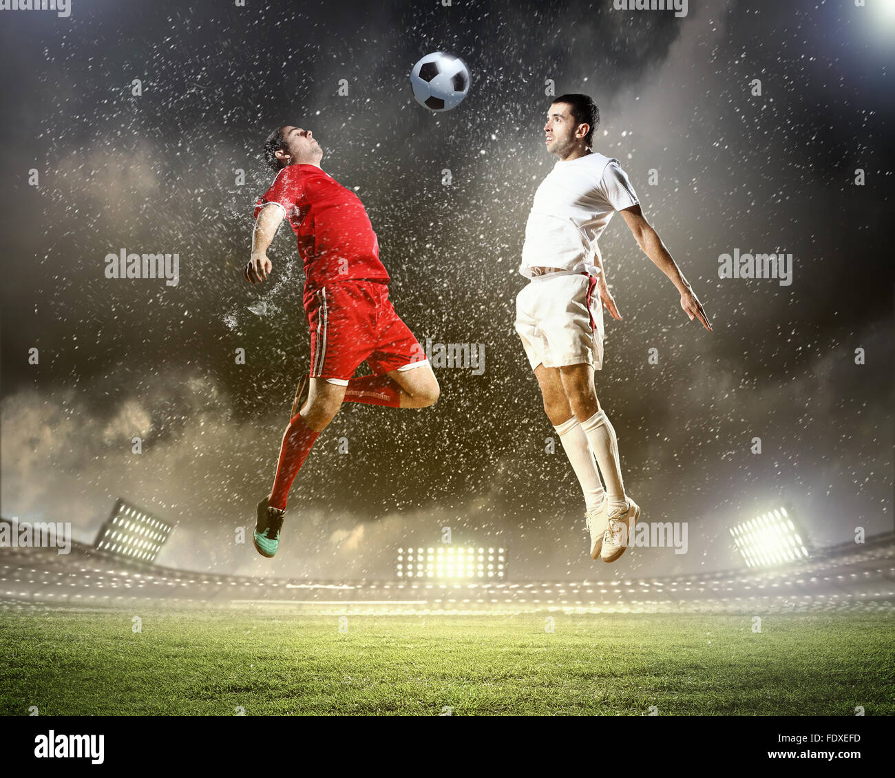 Image of two football players at stadium Stock Photo - Alamy