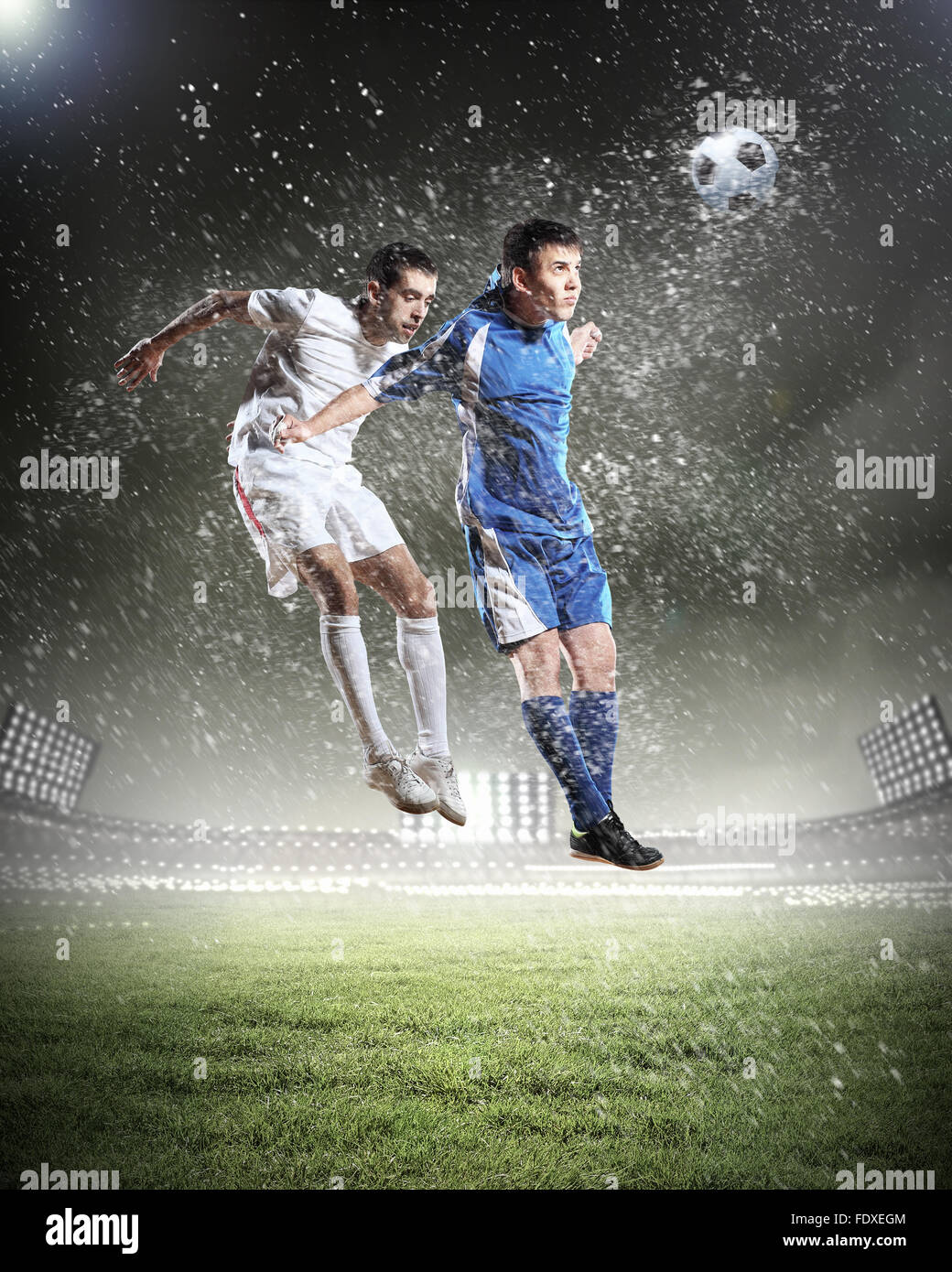 Image of two football players at stadium Stock Photo - Alamy