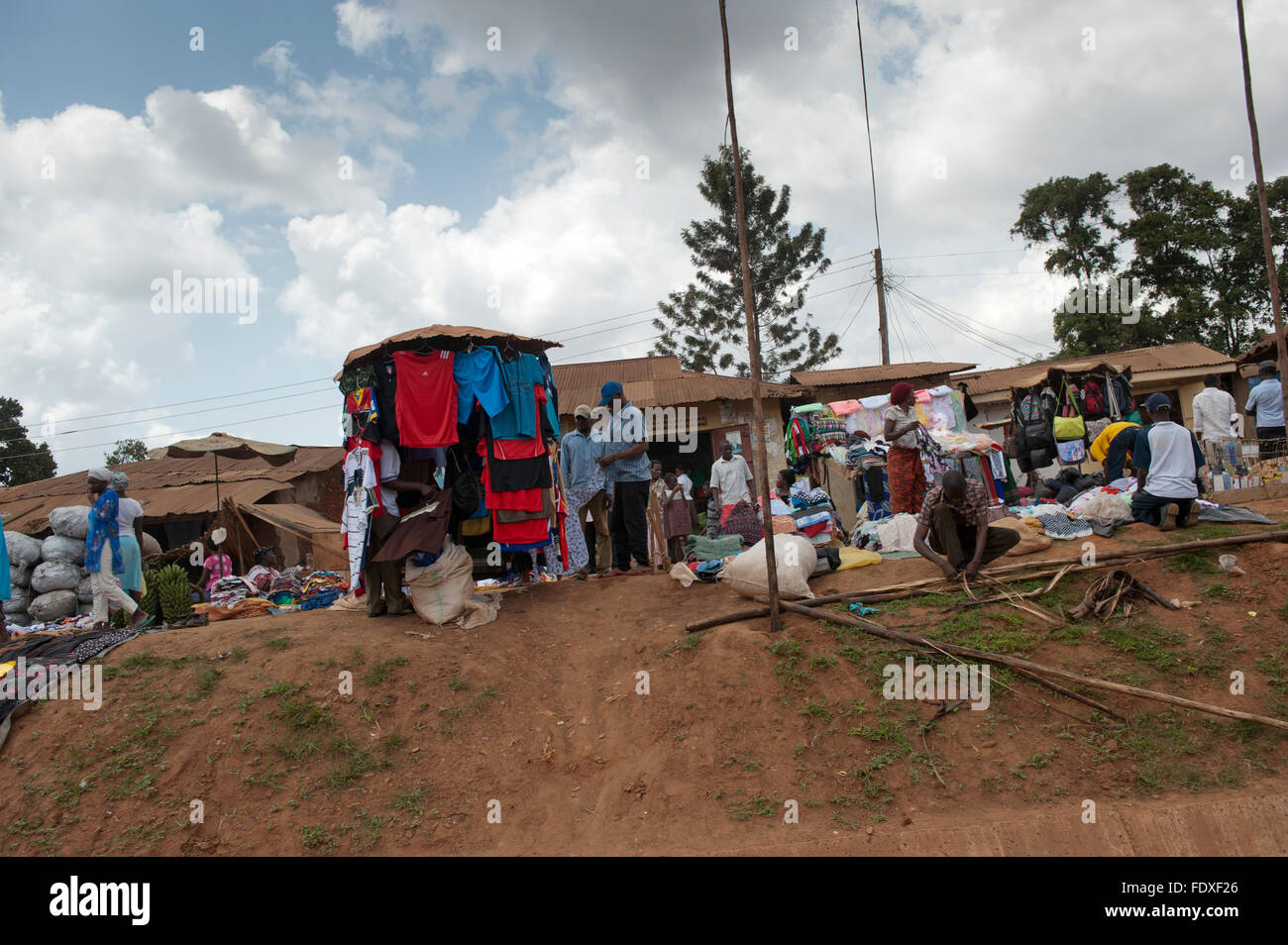 Roadside village scenes in rural Uganda, showing shops and stores along ...