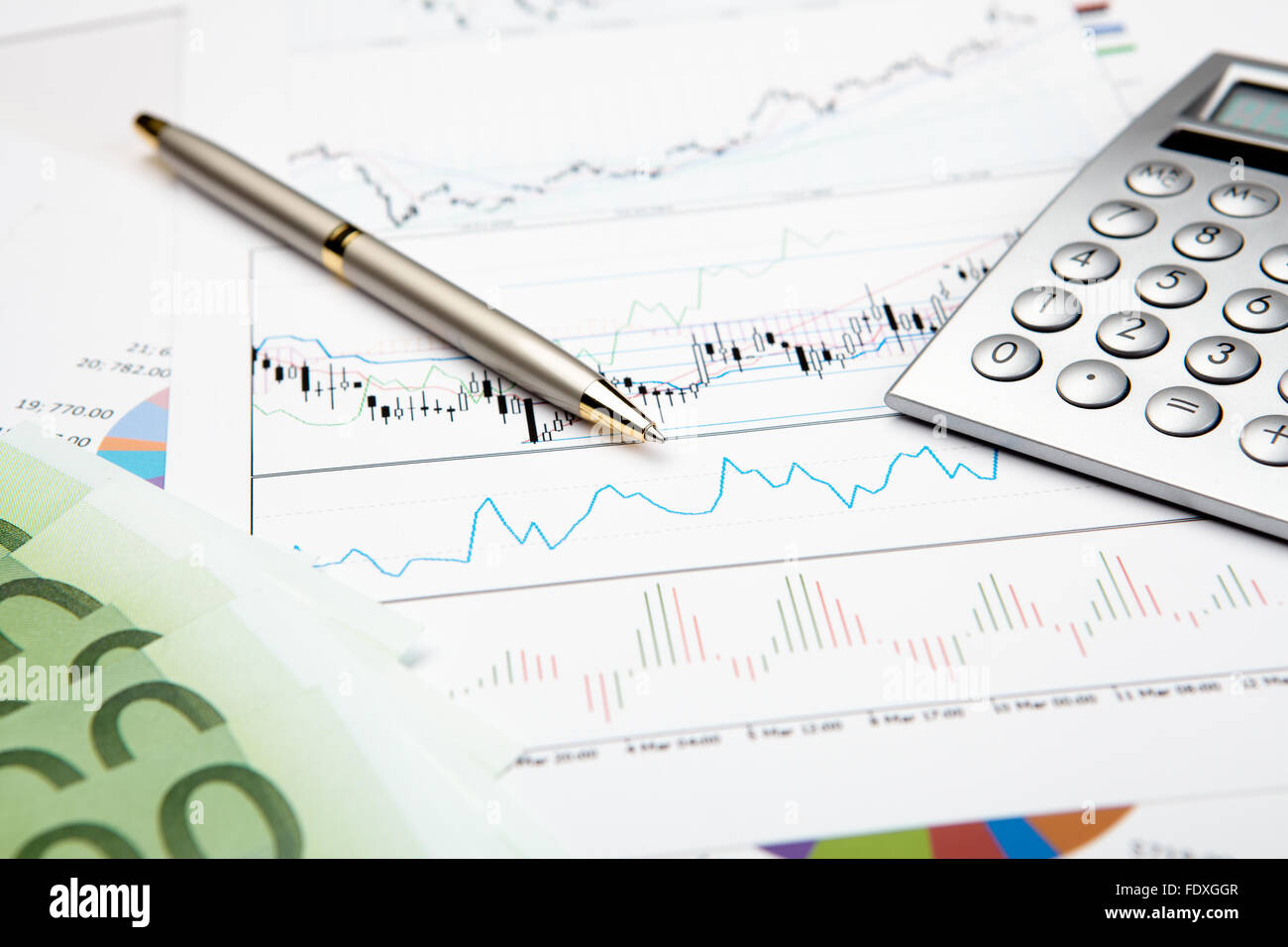 financial charts and graphs on the table Stock Photo - Alamy