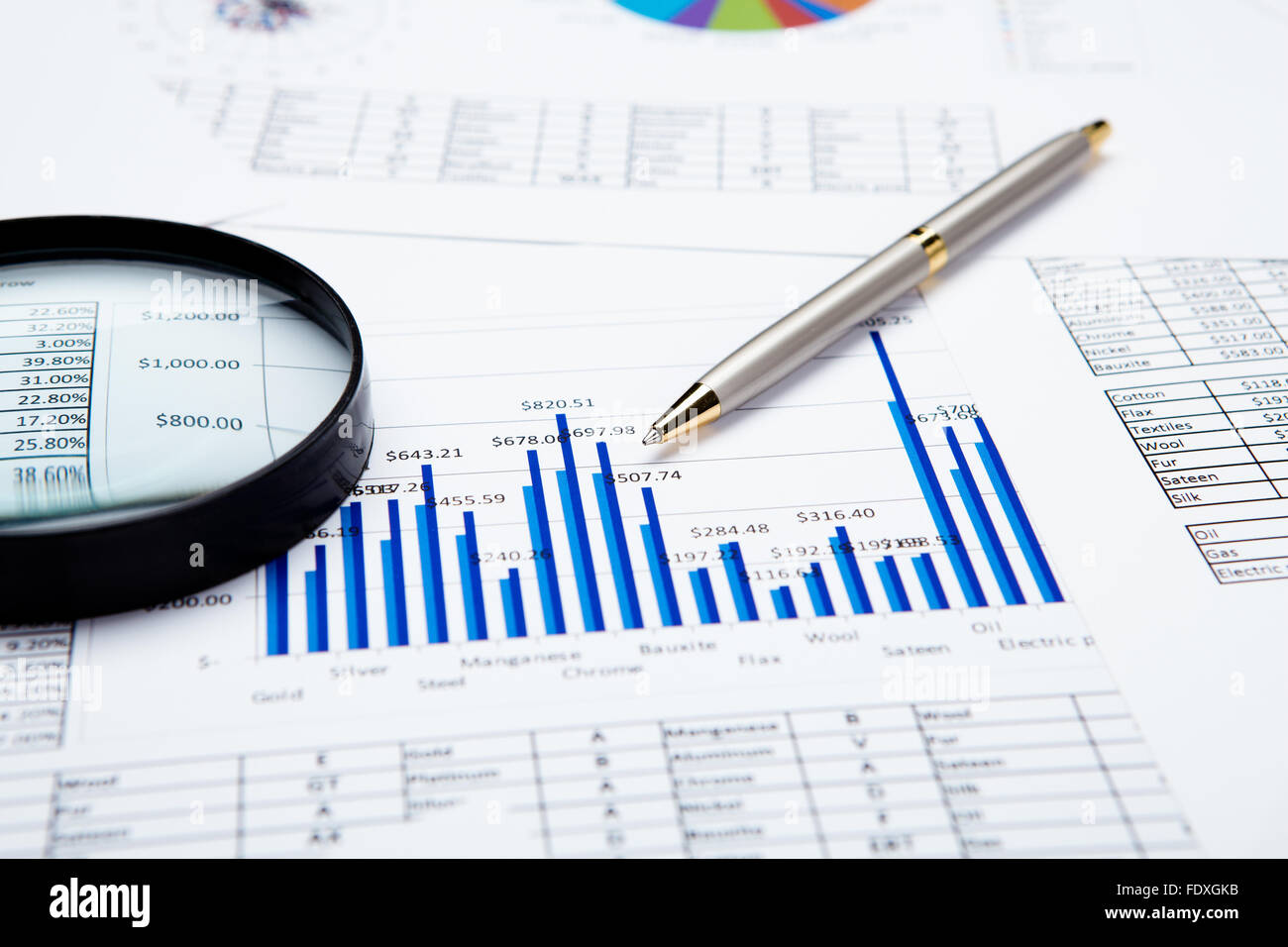 financial charts and graphs on the table Stock Photo - Alamy