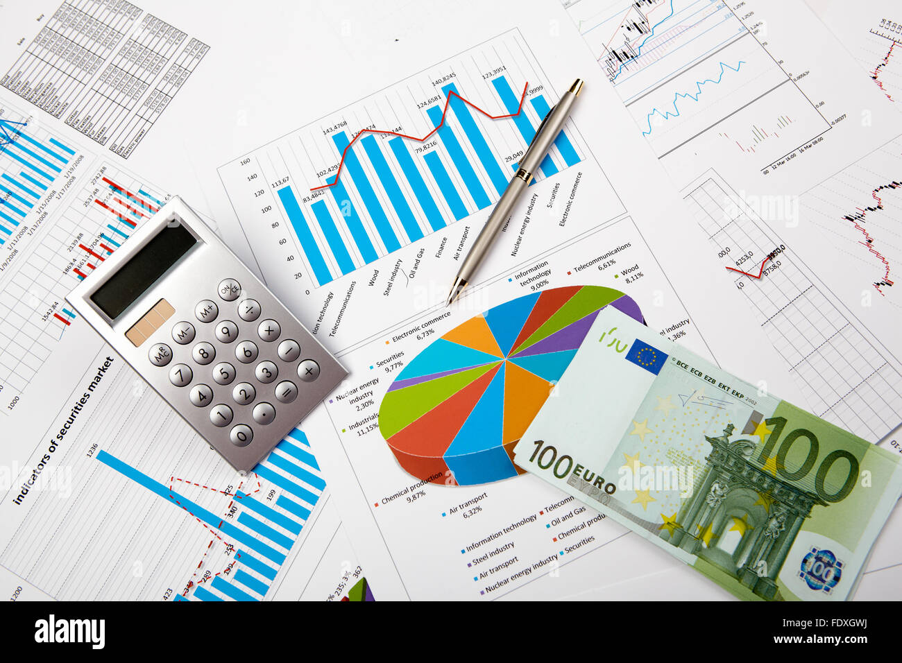 financial charts and graphs on the table Stock Photo - Alamy