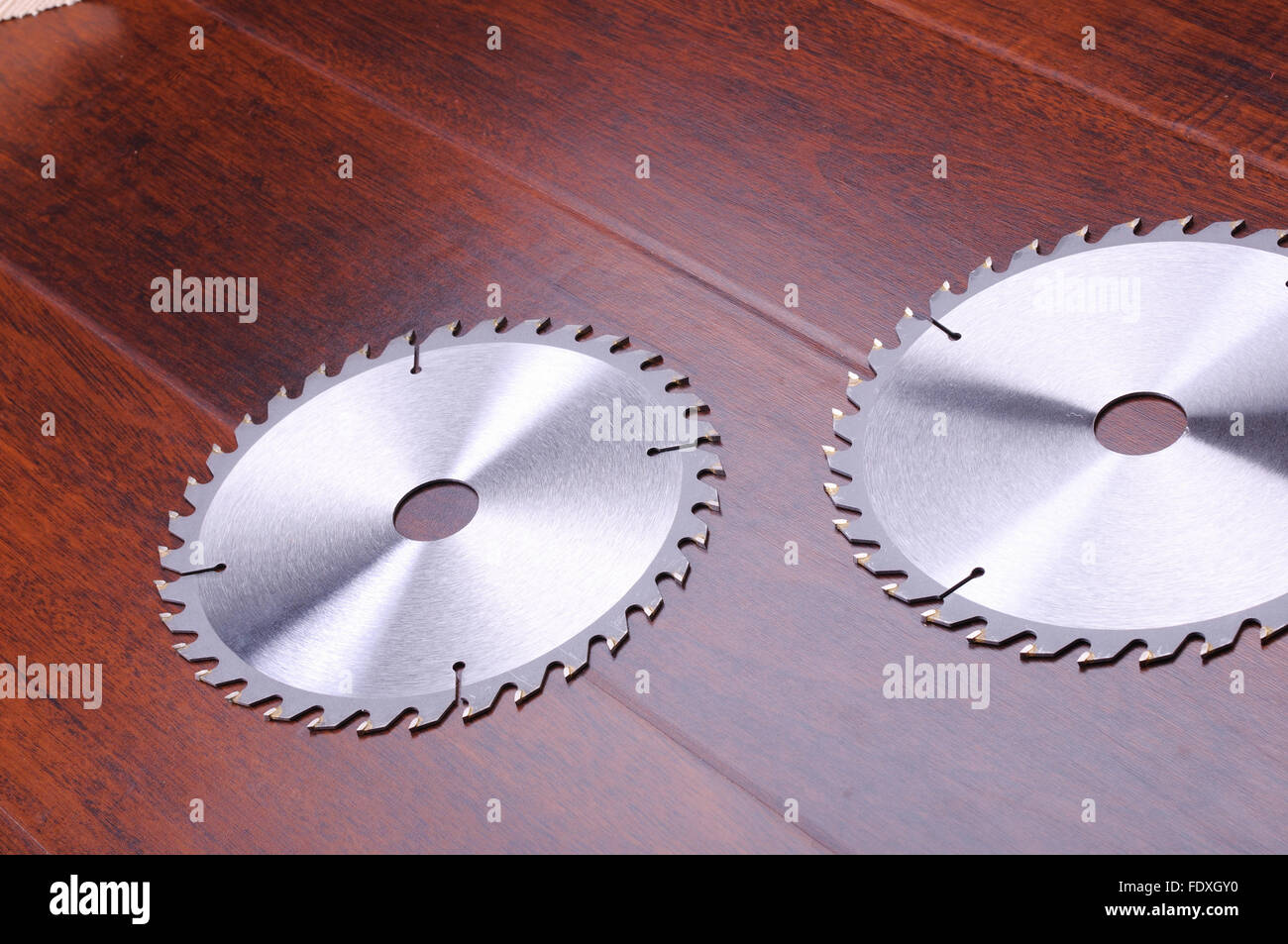 The metal disc is a circular saw on a dark background Stock Photo - Alamy