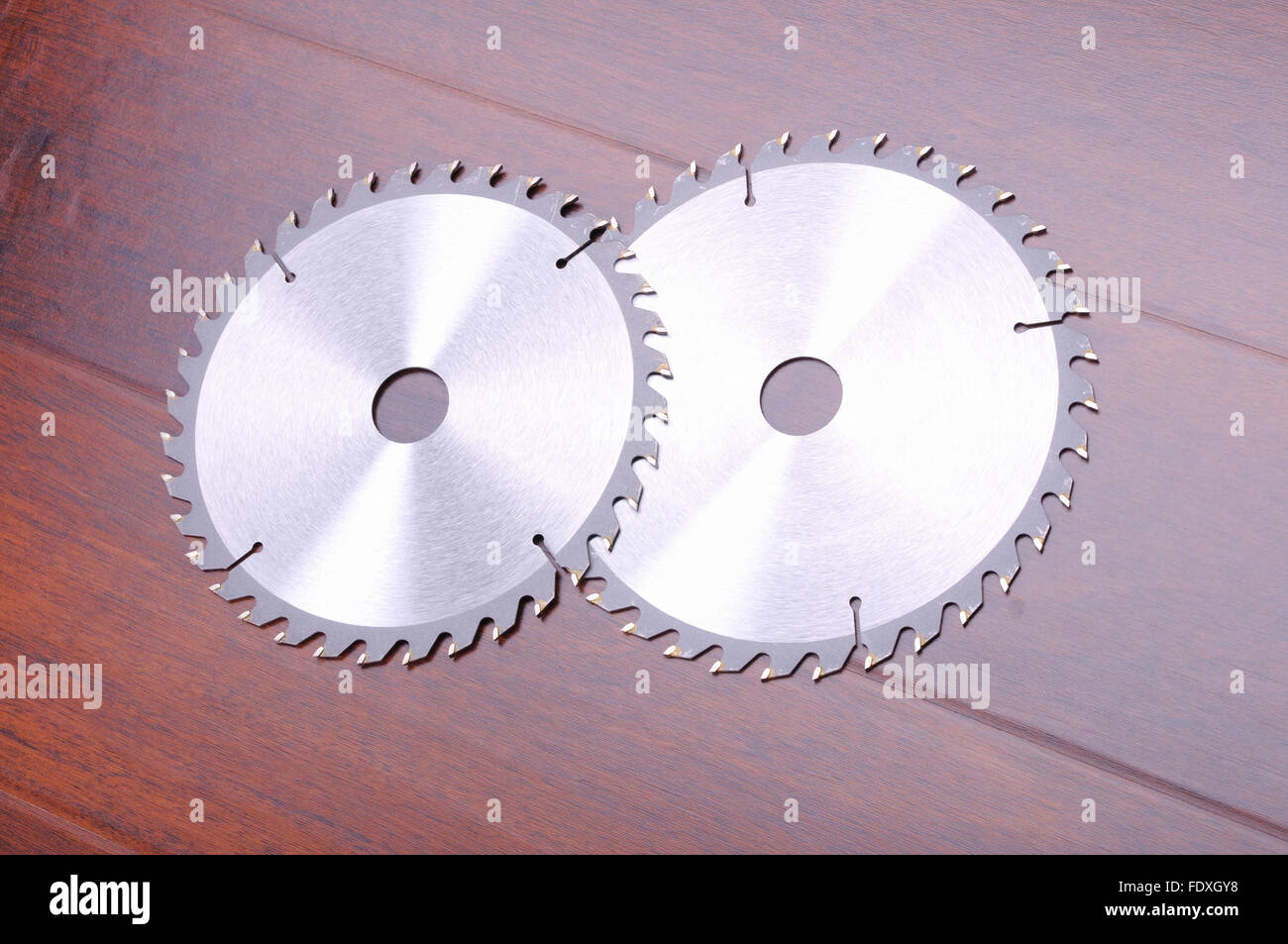 The metal disc is a circular saw on a dark background Stock Photo - Alamy