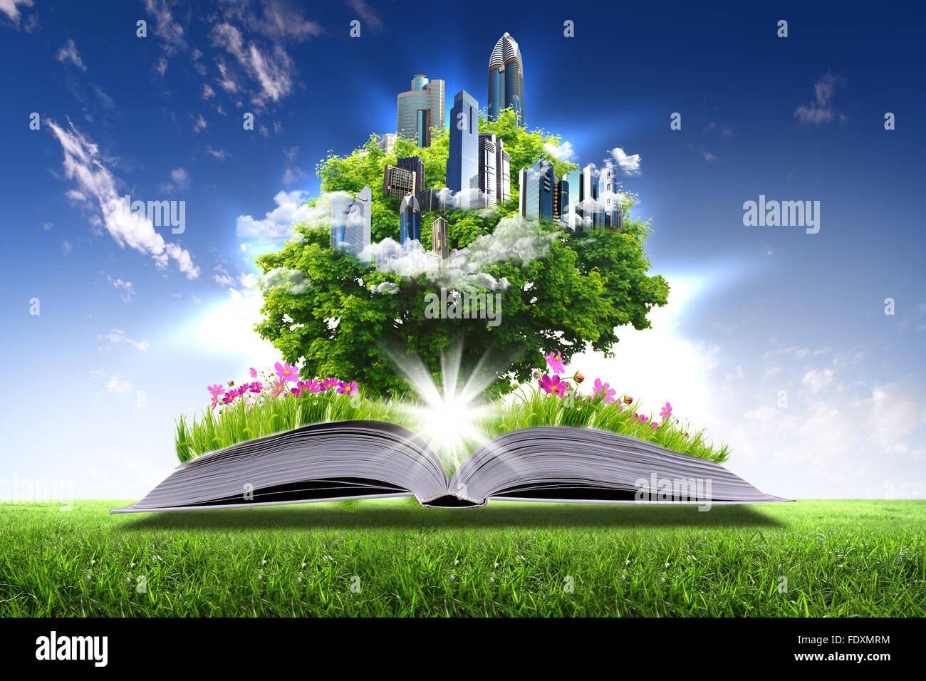Open book with green nature world coming out of its pages Stock Photo ...