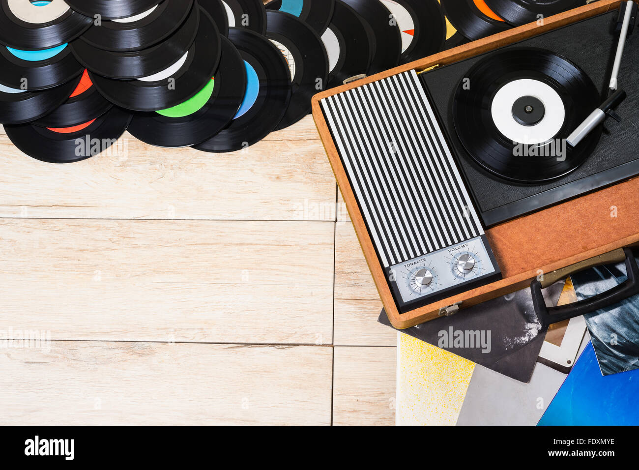 Gramophone with a vinyl records on wooden table, top view and copy ...