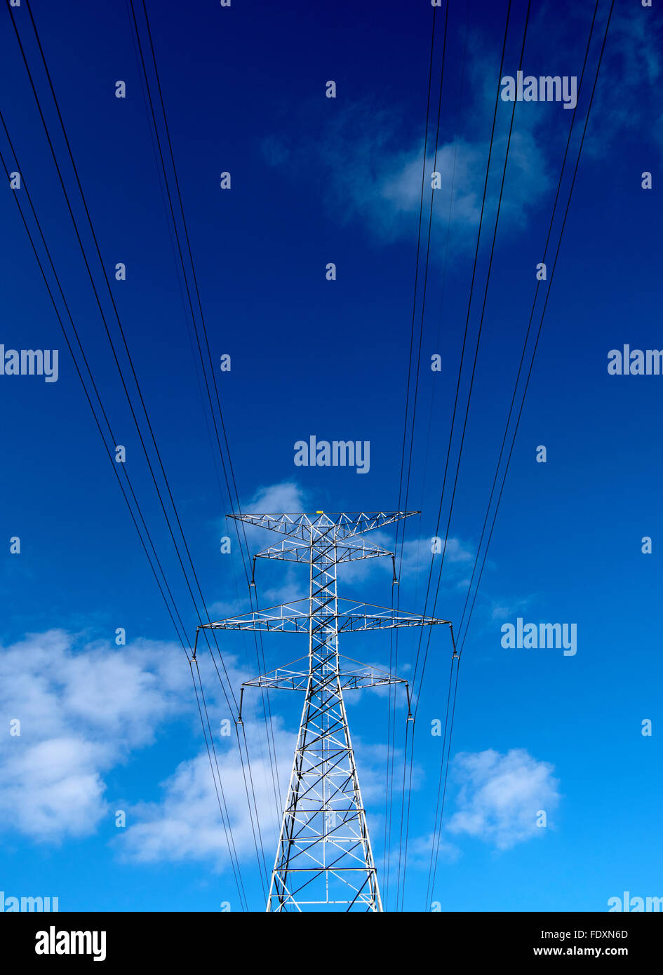 electrical power lines with blue sky and clouds Stock Photo - Alamy