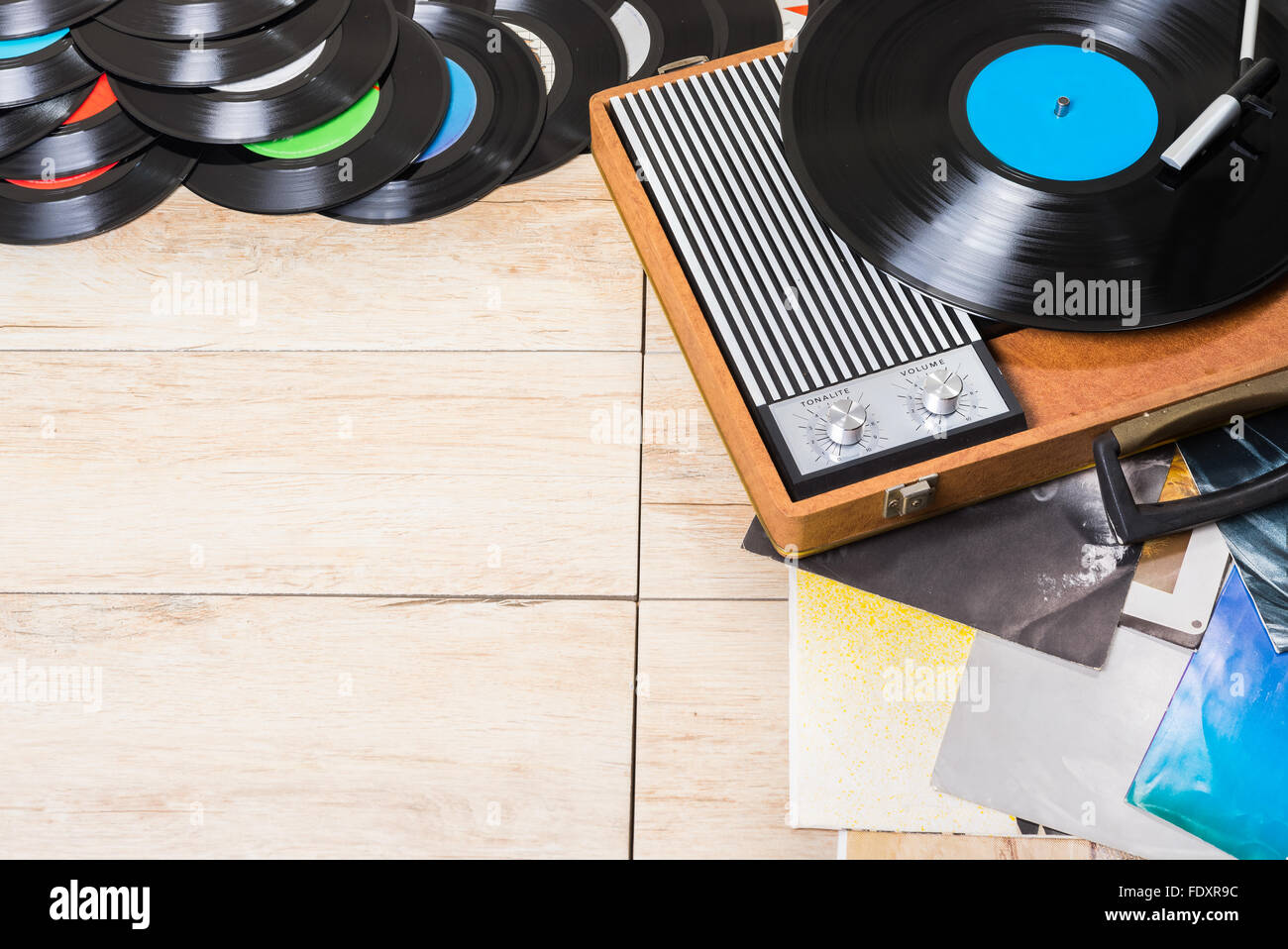 Gramophone with a vinyl records on wooden table, top view and copy ...