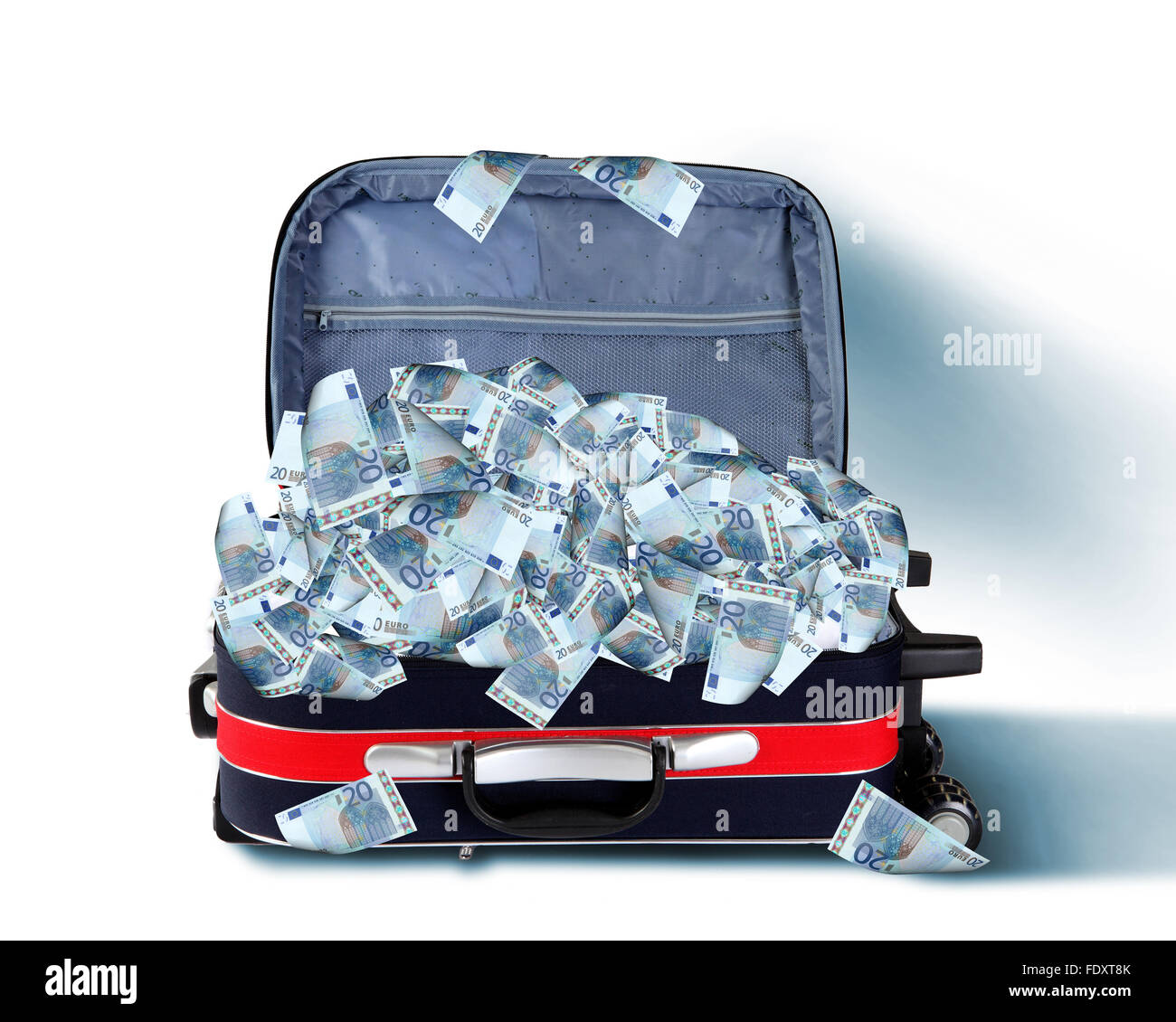 Picture of red travel suitcase full of banknotes Stock Photo - Alamy