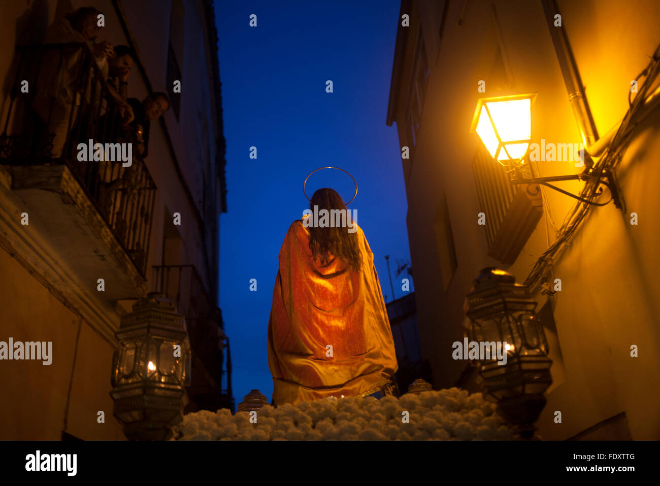 People watch a sculpture of Mary Magdalene from a balcony during an ...