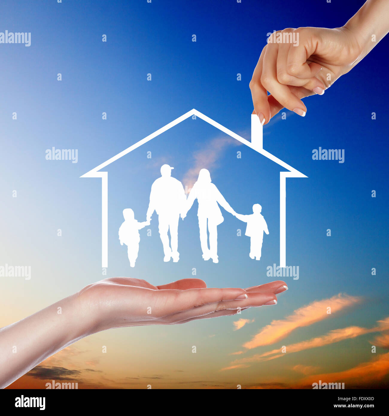 human hand and symbol of house with people inside Stock Photo - Alamy
