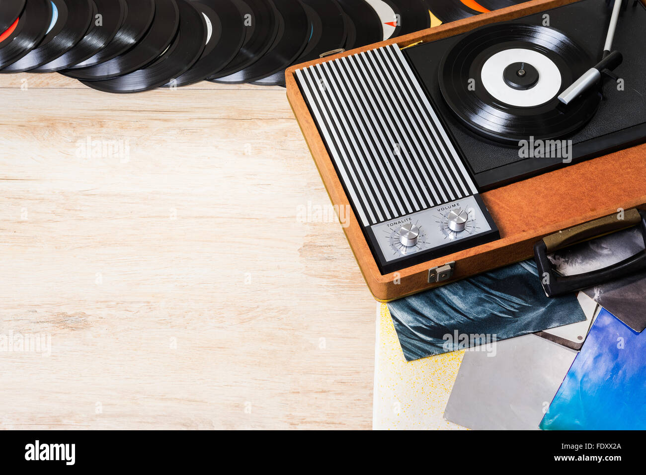 Gramophone with a vinyl records on wooden table, top view and copy ...