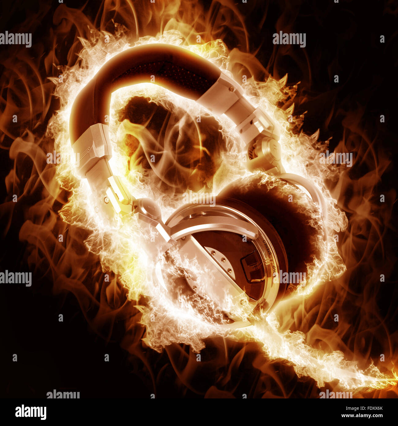 headphones open arms fire on a black background Stock Photo - Alamy