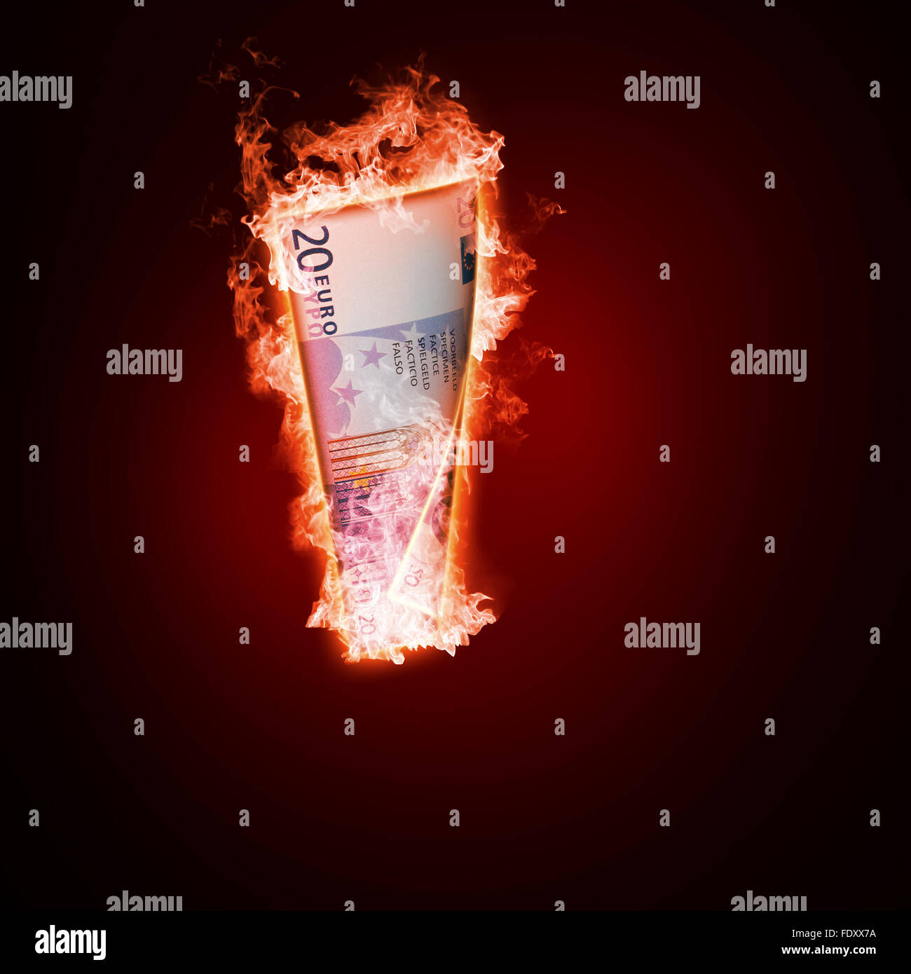 Banknotes open arms fire on a black background Stock Photo - Alamy