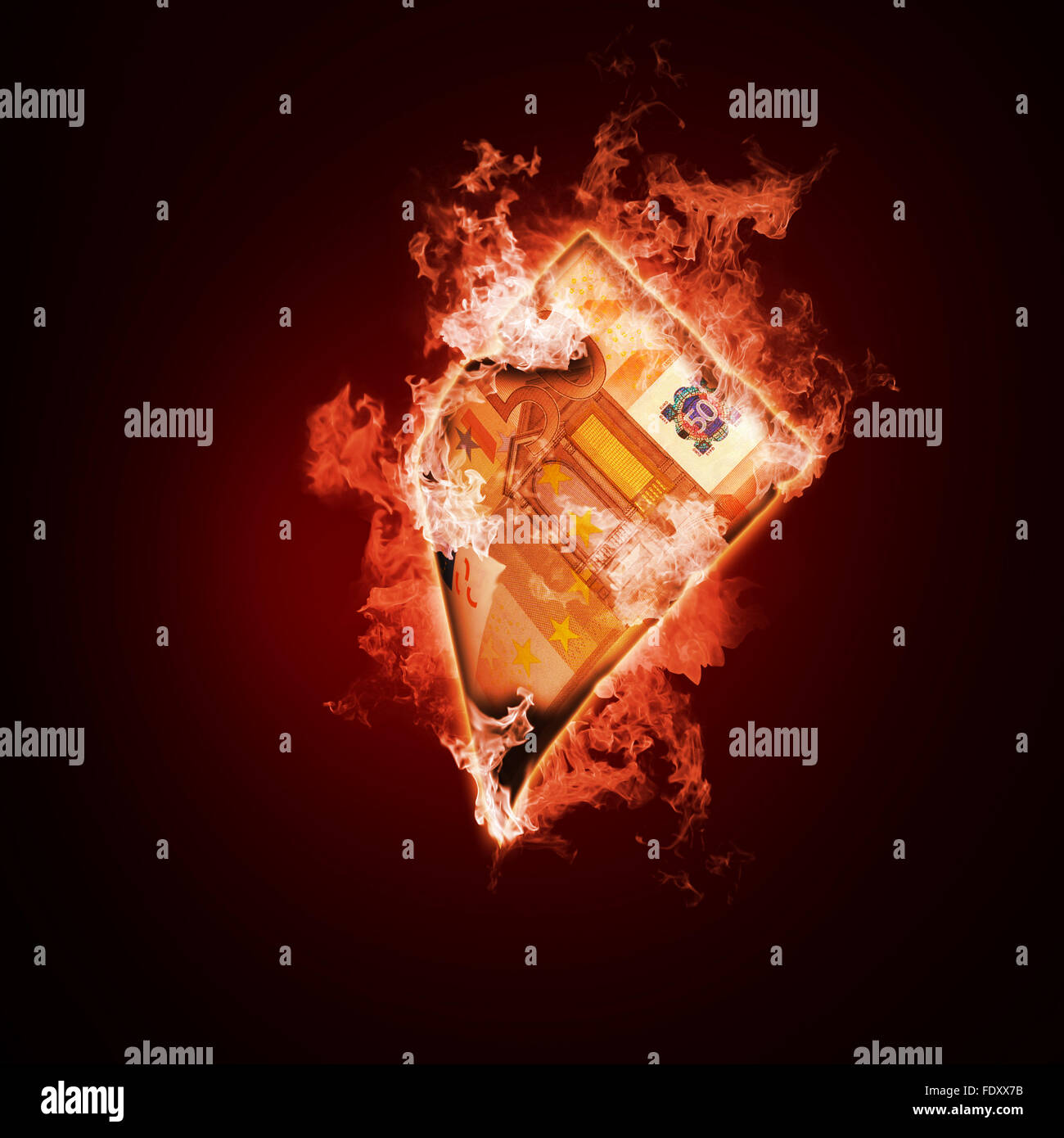 Banknotes open arms fire on a black background Stock Photo - Alamy