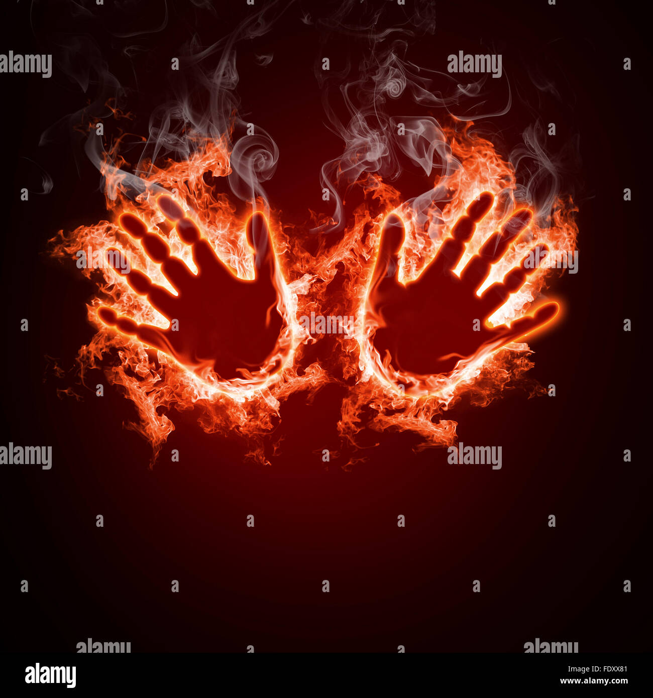 Hands open arms fire on a black background Stock Photo - Alamy