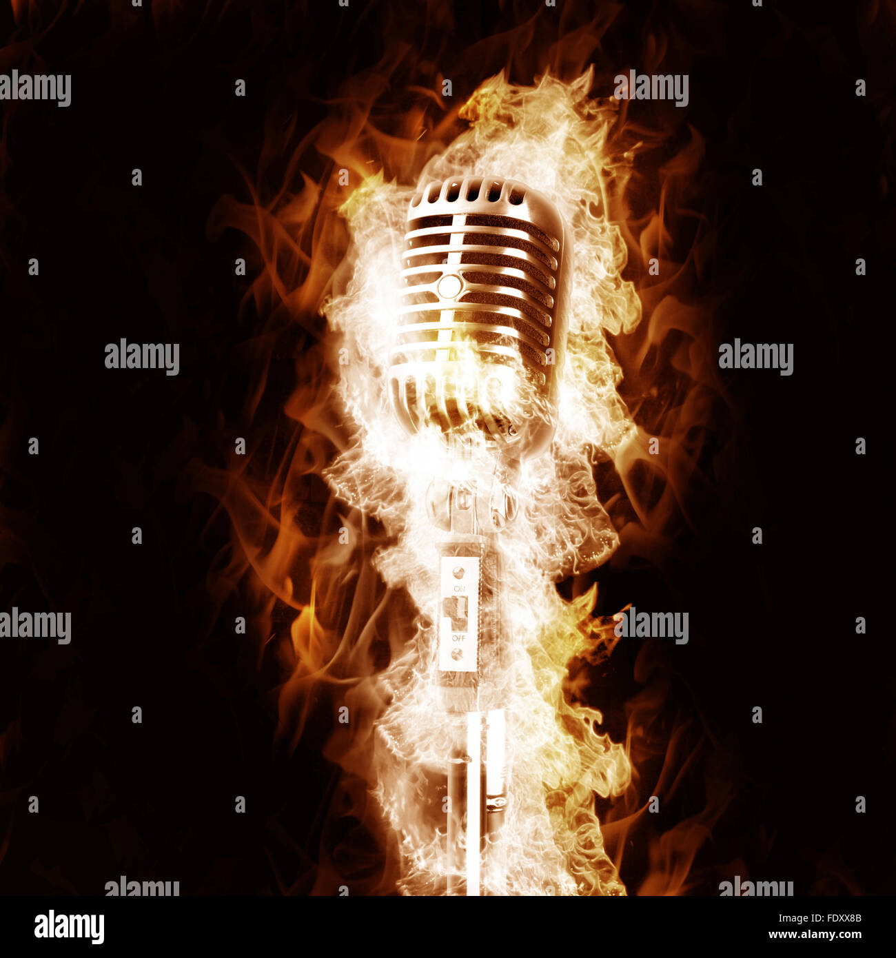 Microphone open arms fire on a black background Stock Photo - Alamy