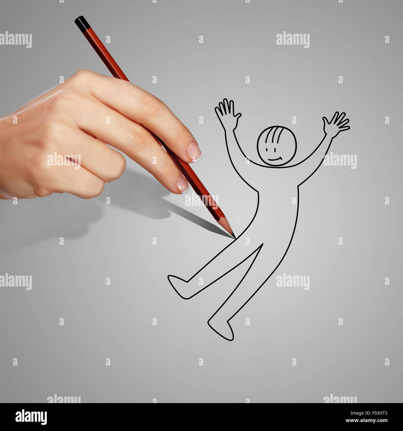 Human hand with a pencil drawing the man Stock Photo - Alamy