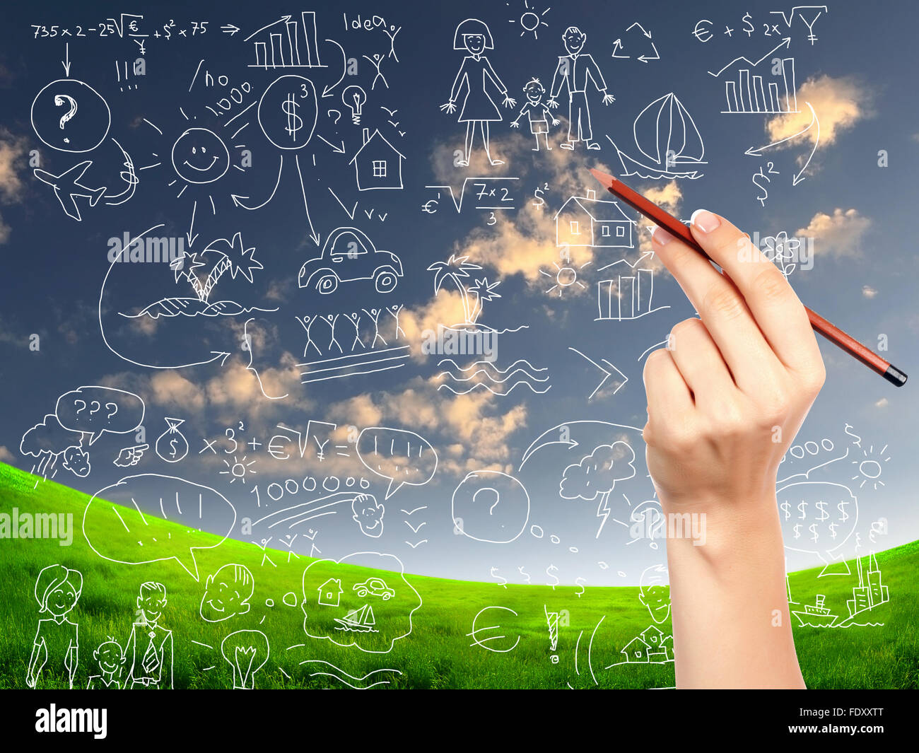 human hand drawing different pictures with pencil on the sky Stock ...