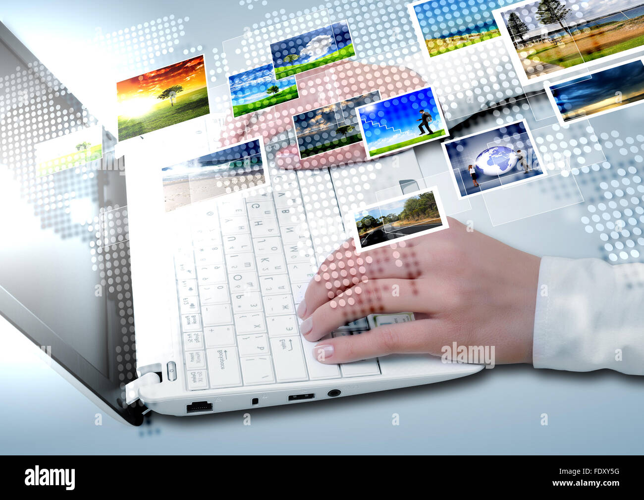 Laptop and business person against technology background Stock Photo ...