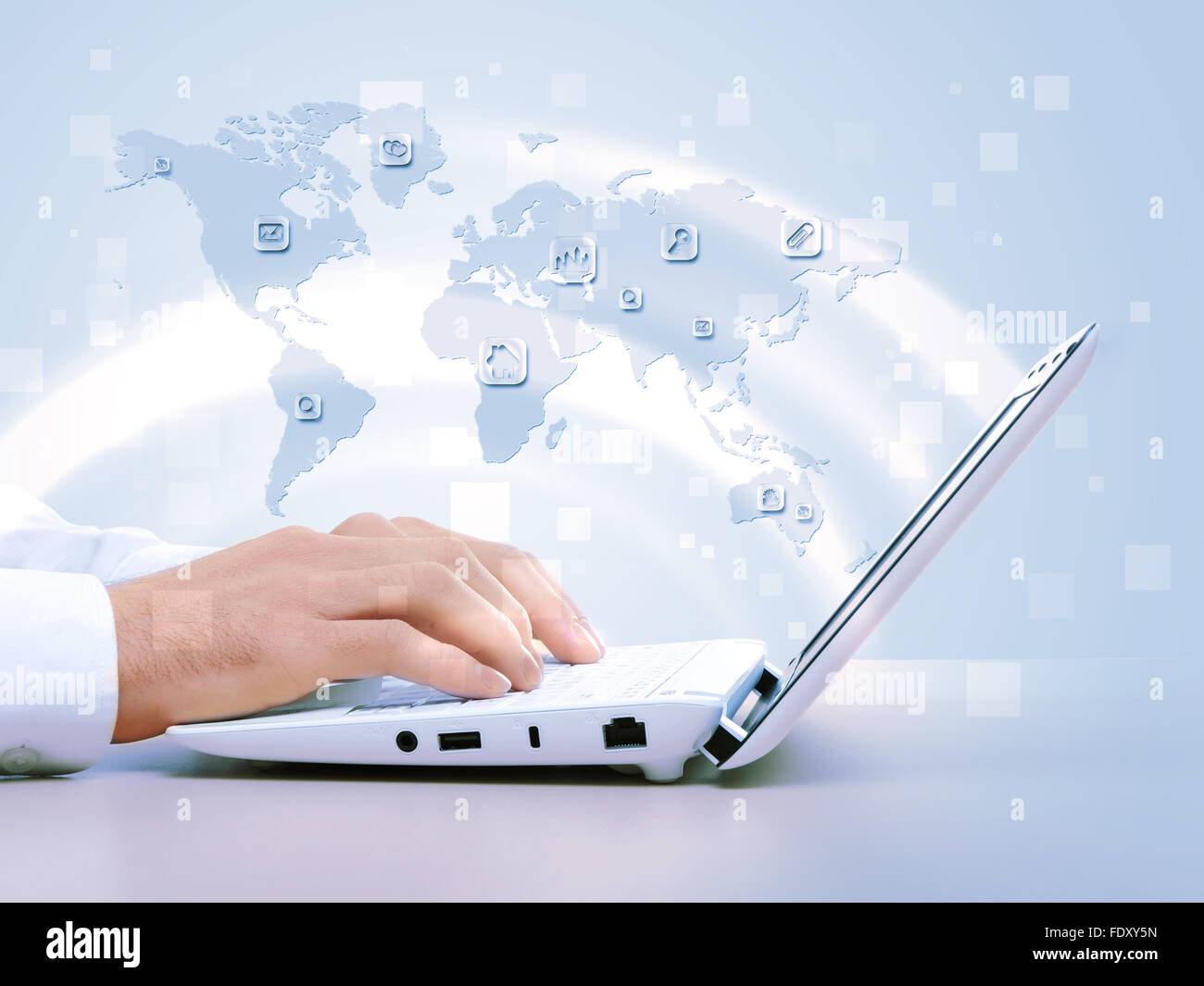 Laptop and business person against technology background Stock Photo ...