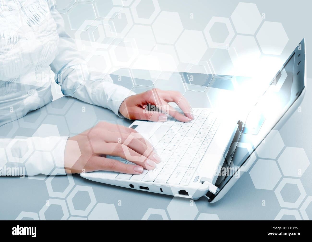 Laptop and business person against technology background Stock Photo ...