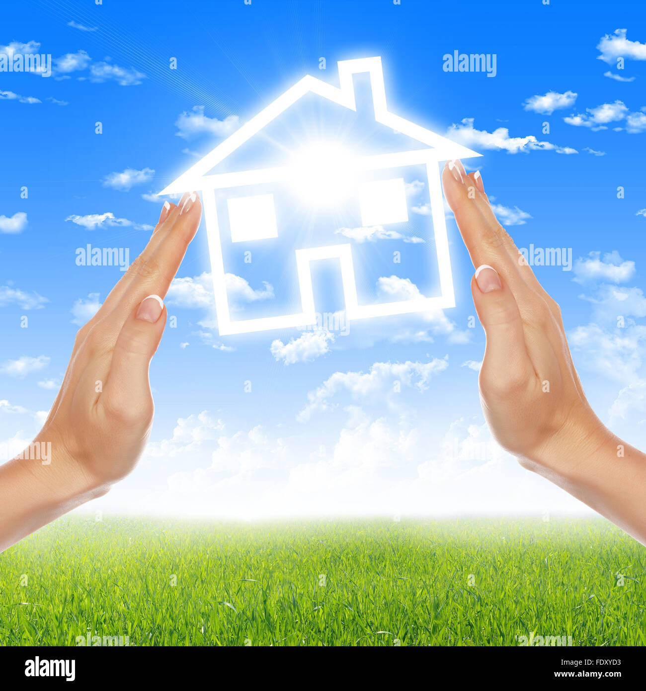 human hands holding model of a house against nature background Stock ...
