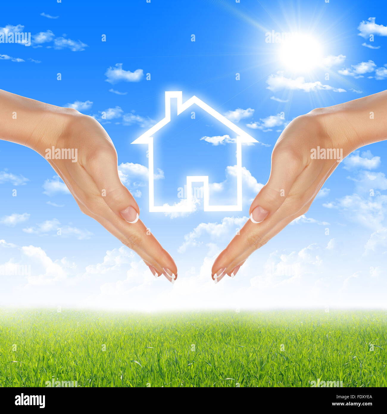 human hands holding model of a house against nature background Stock ...