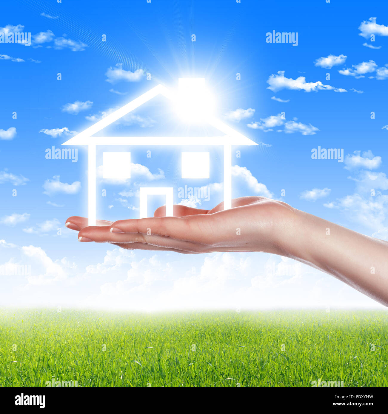 human hands holding model of a house against nature background Stock ...