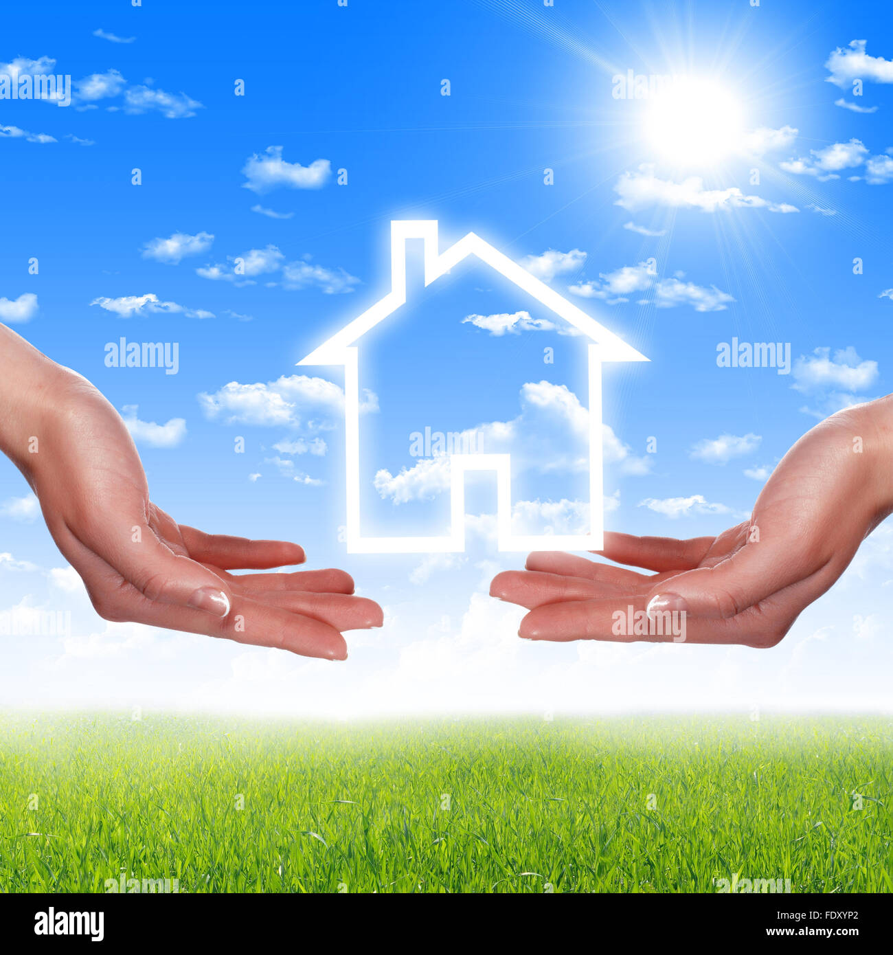 human hands holding model of a house against nature background Stock ...