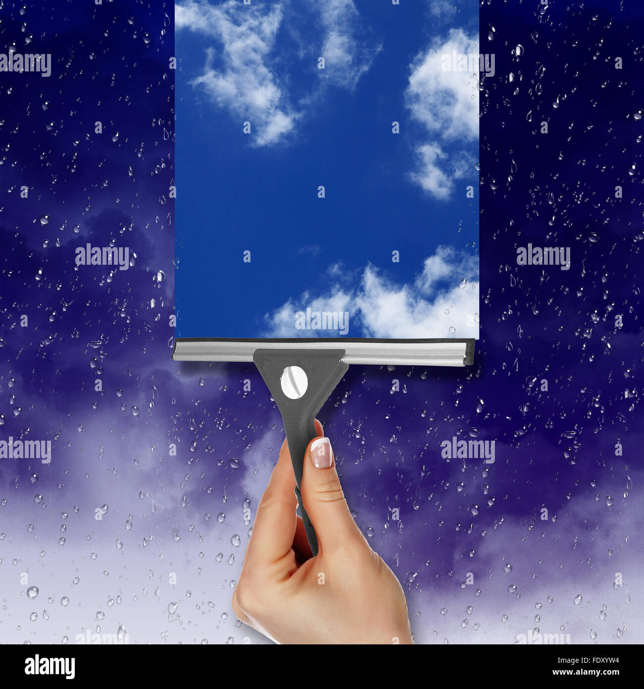 Hand cleaning window with blue sky and white clouds Stock Photo - Alamy